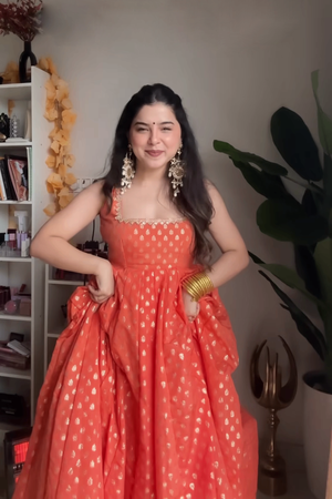 Neha Bhandari Orange Jacquard Anarkali Gown